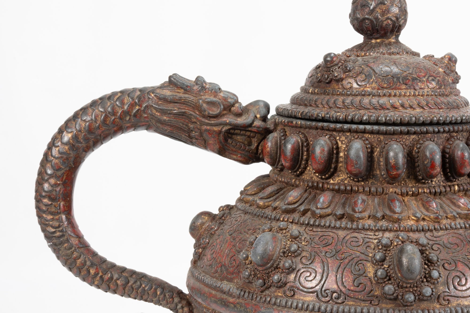 A LARGE TIBETAN BRONZE TEAPOT