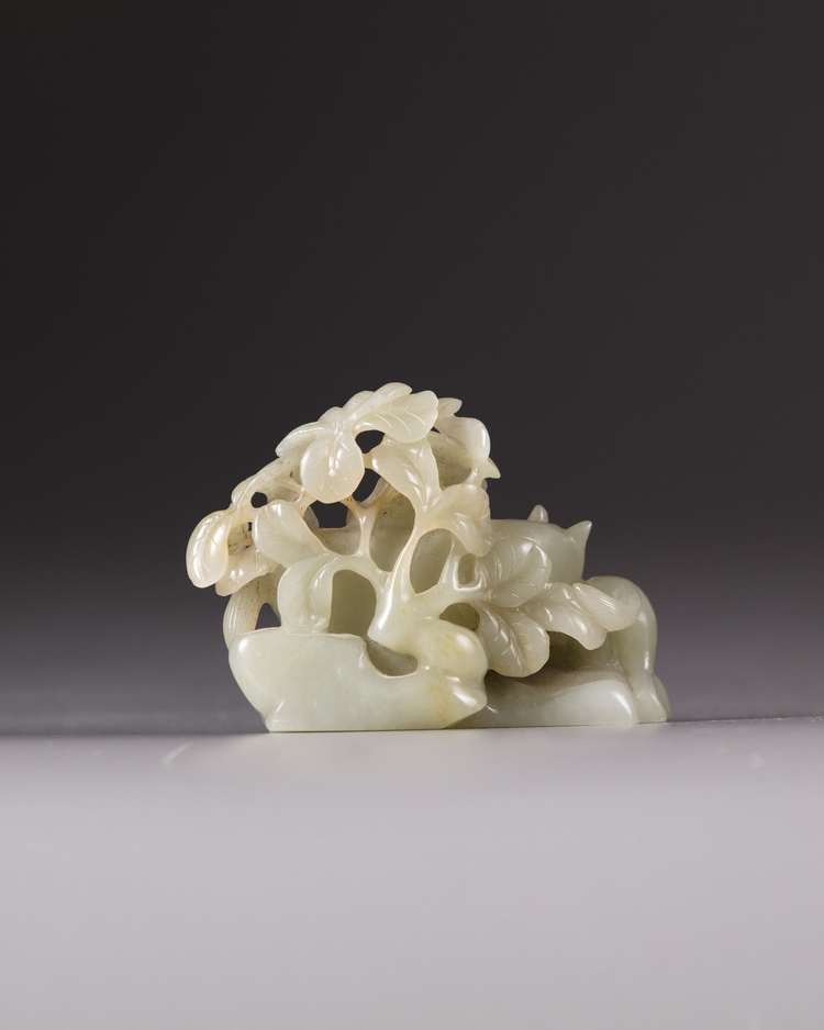 A Chinese celadon jade 'animal' group