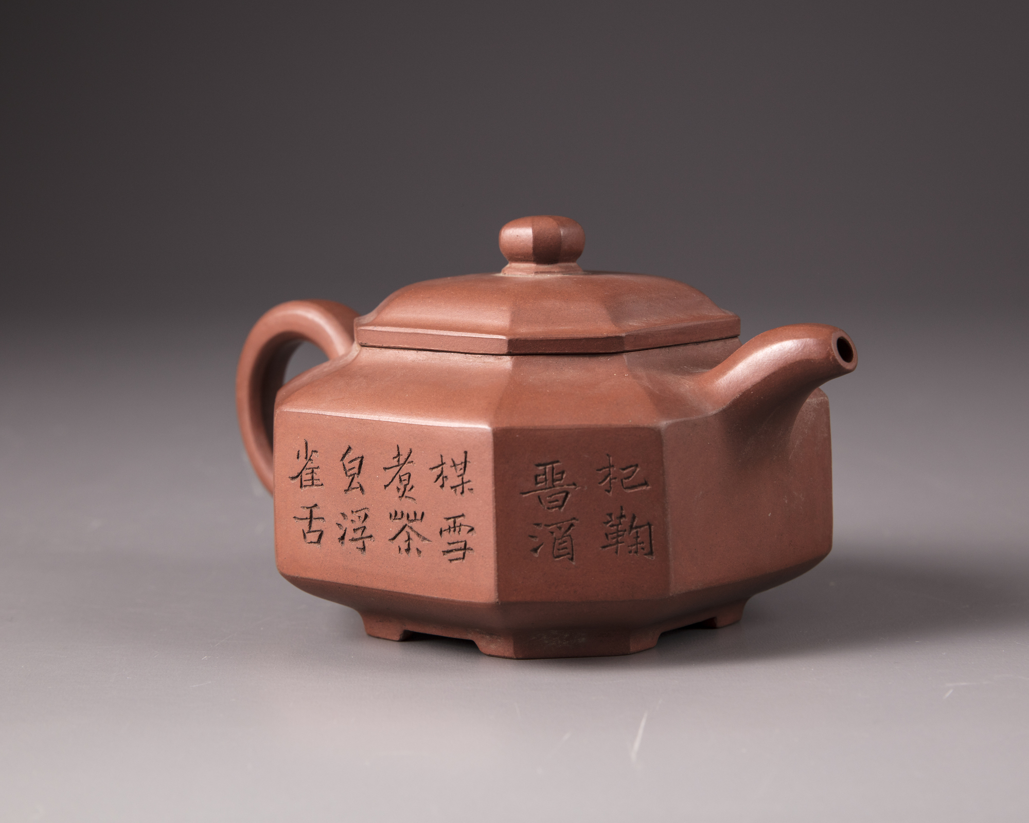 A Chinese yixing 'inscribed' hexagonal teapot
