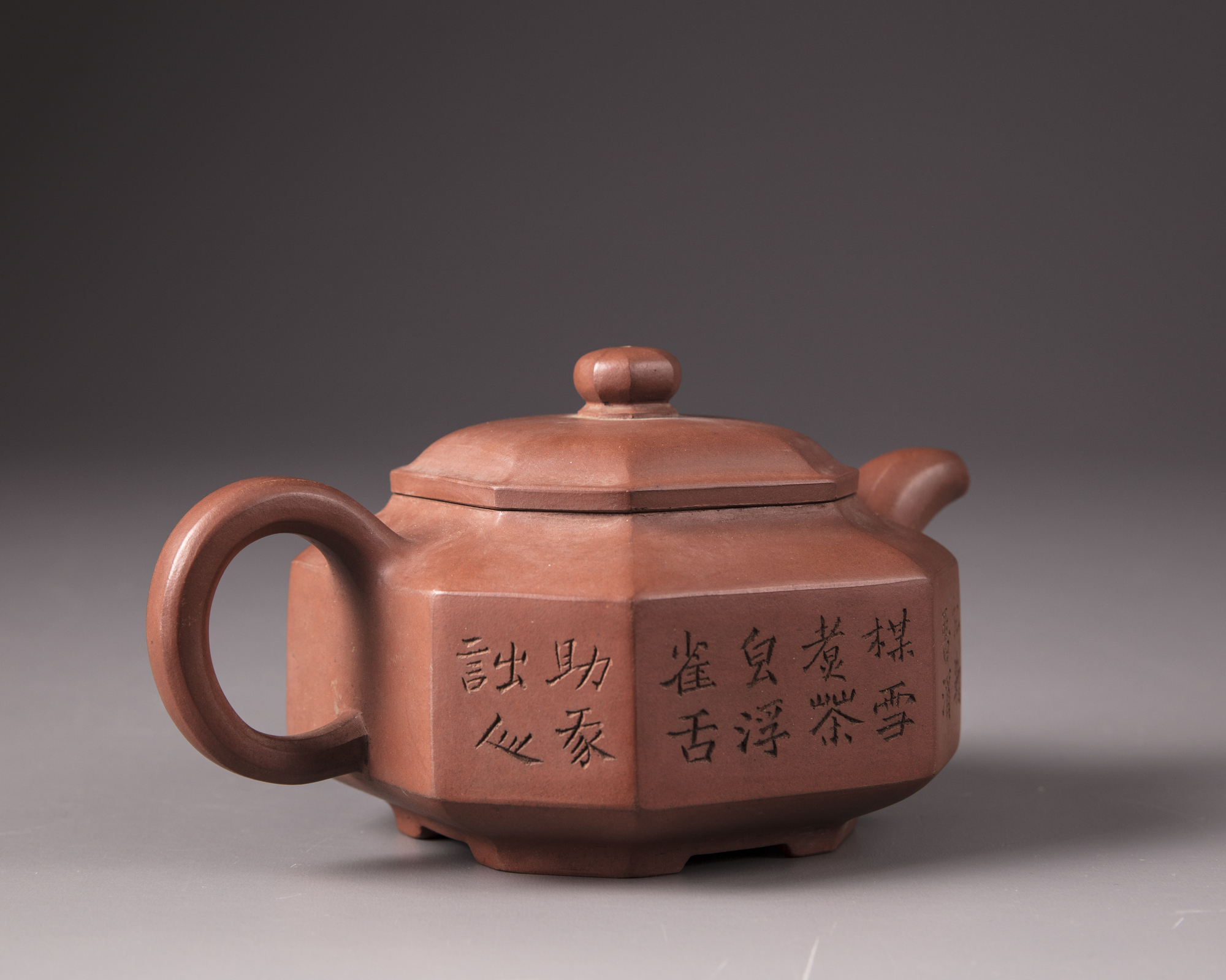A Chinese yixing 'inscribed' hexagonal teapot