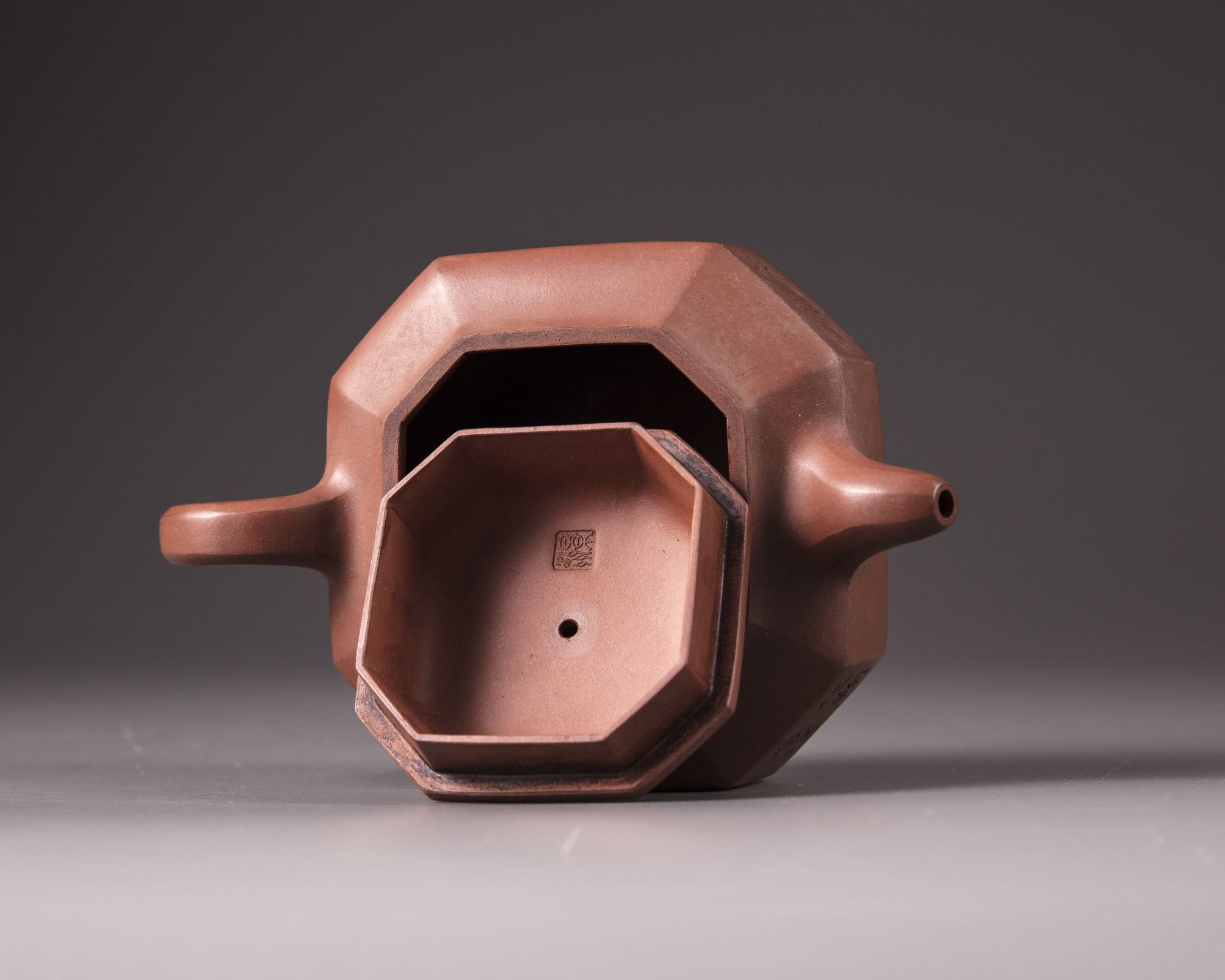 A Chinese yixing 'inscribed' hexagonal teapot
