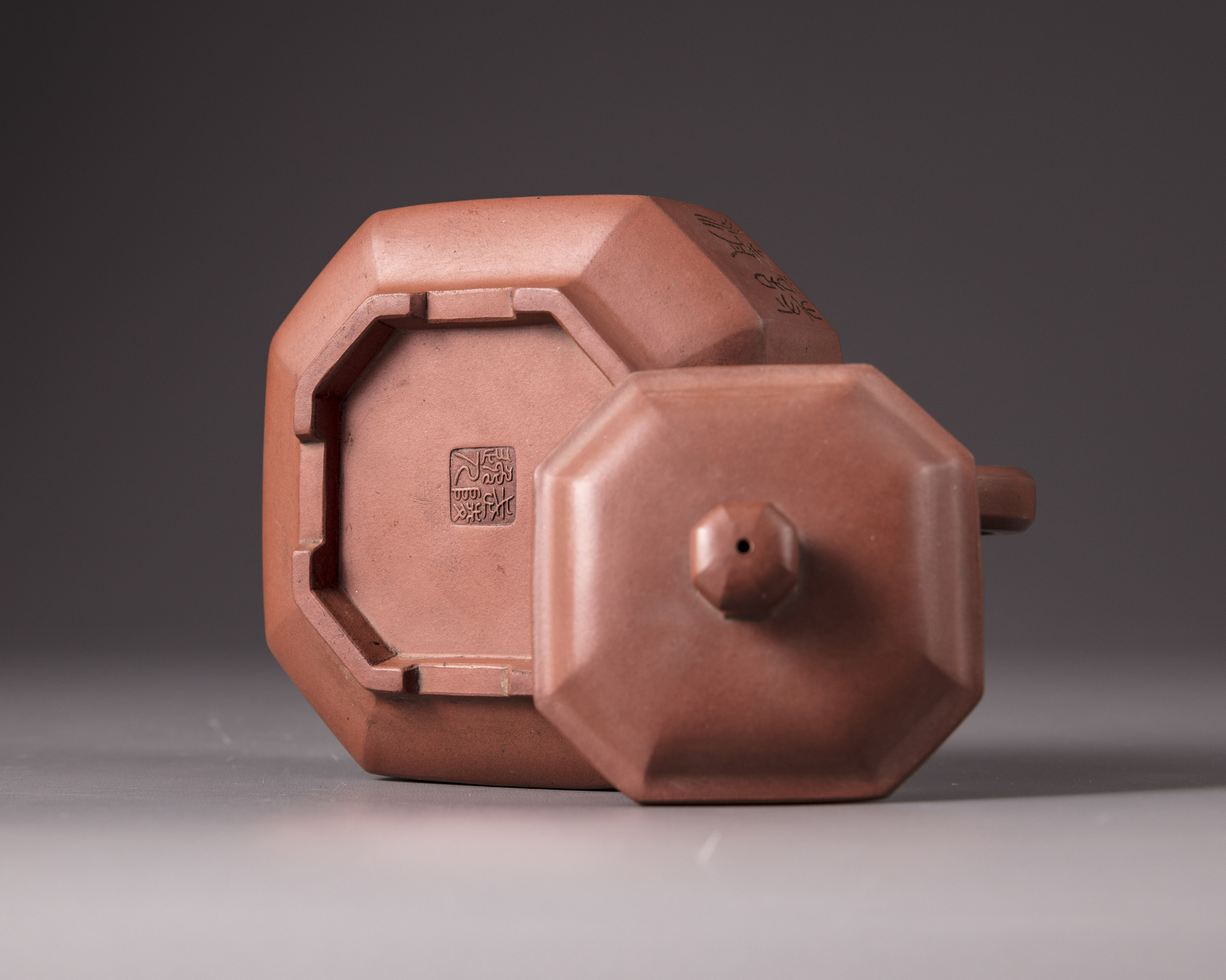 A Chinese yixing 'inscribed' hexagonal teapot