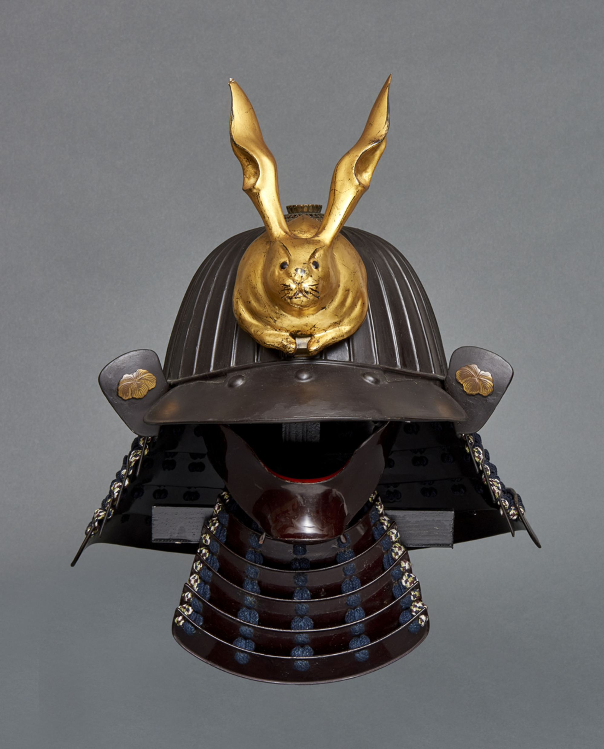 A thirty-two plate black sujibachi-helmet with four neck-guards (shikoro)