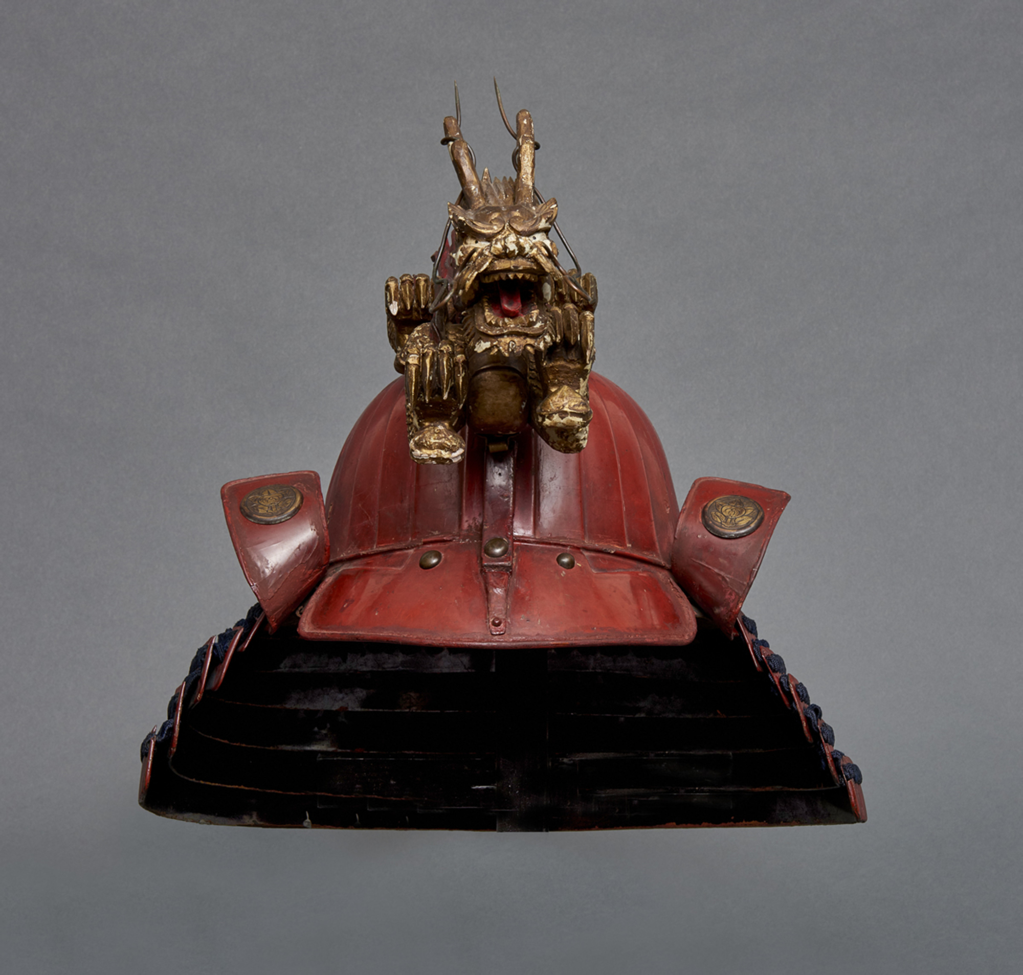 A red lacquered twenty-four plate sujikabuto-helmet with five neck ...