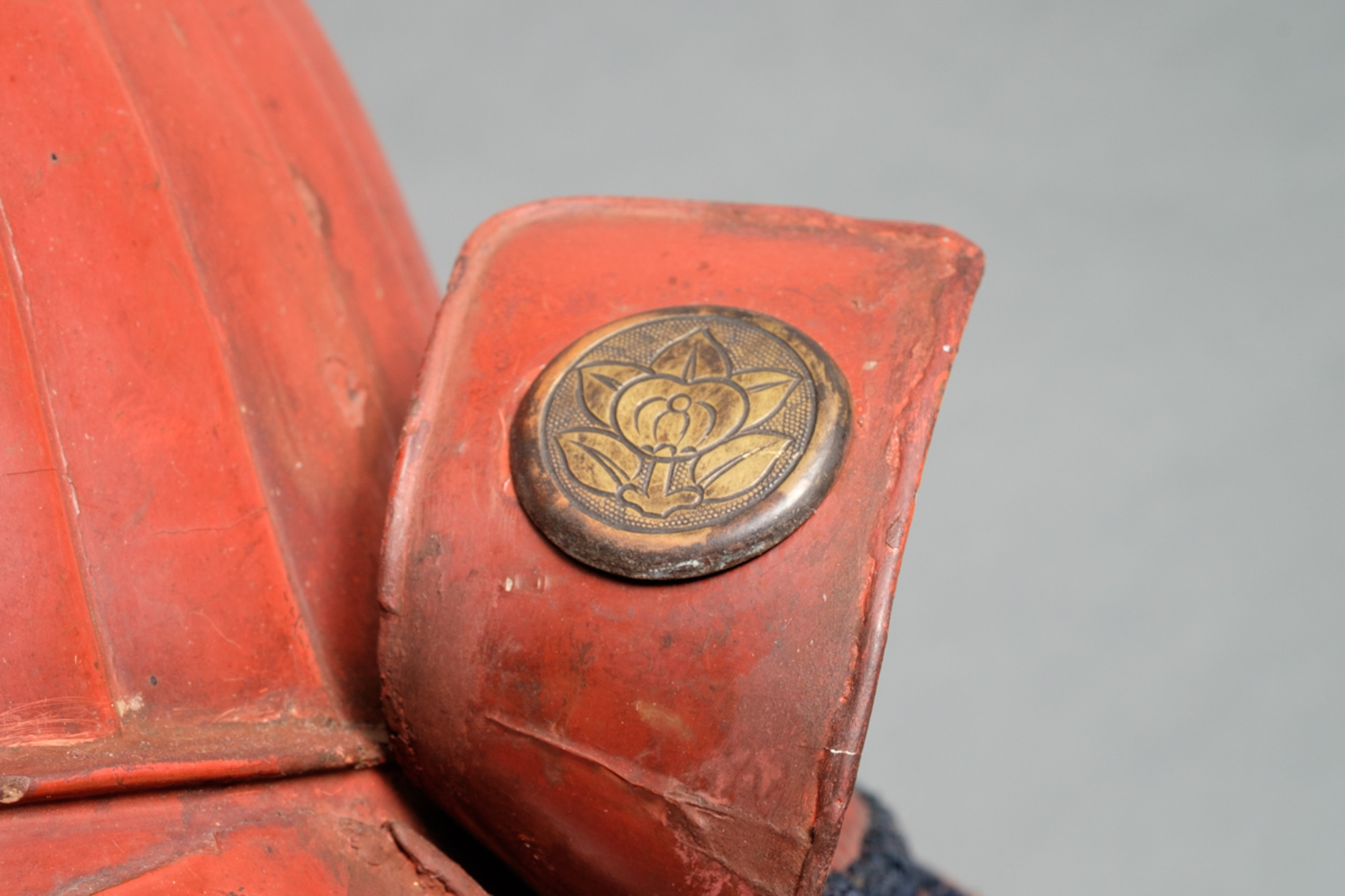 A red lacquered twenty-four plate sujikabuto-helmet with five neck ...