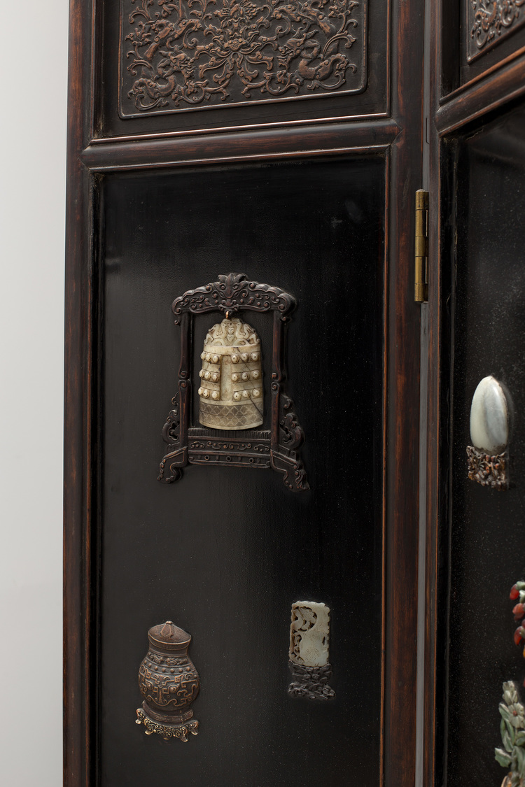 A Chinese precious objects-inlaid black lacquer carved wood six-fold screen