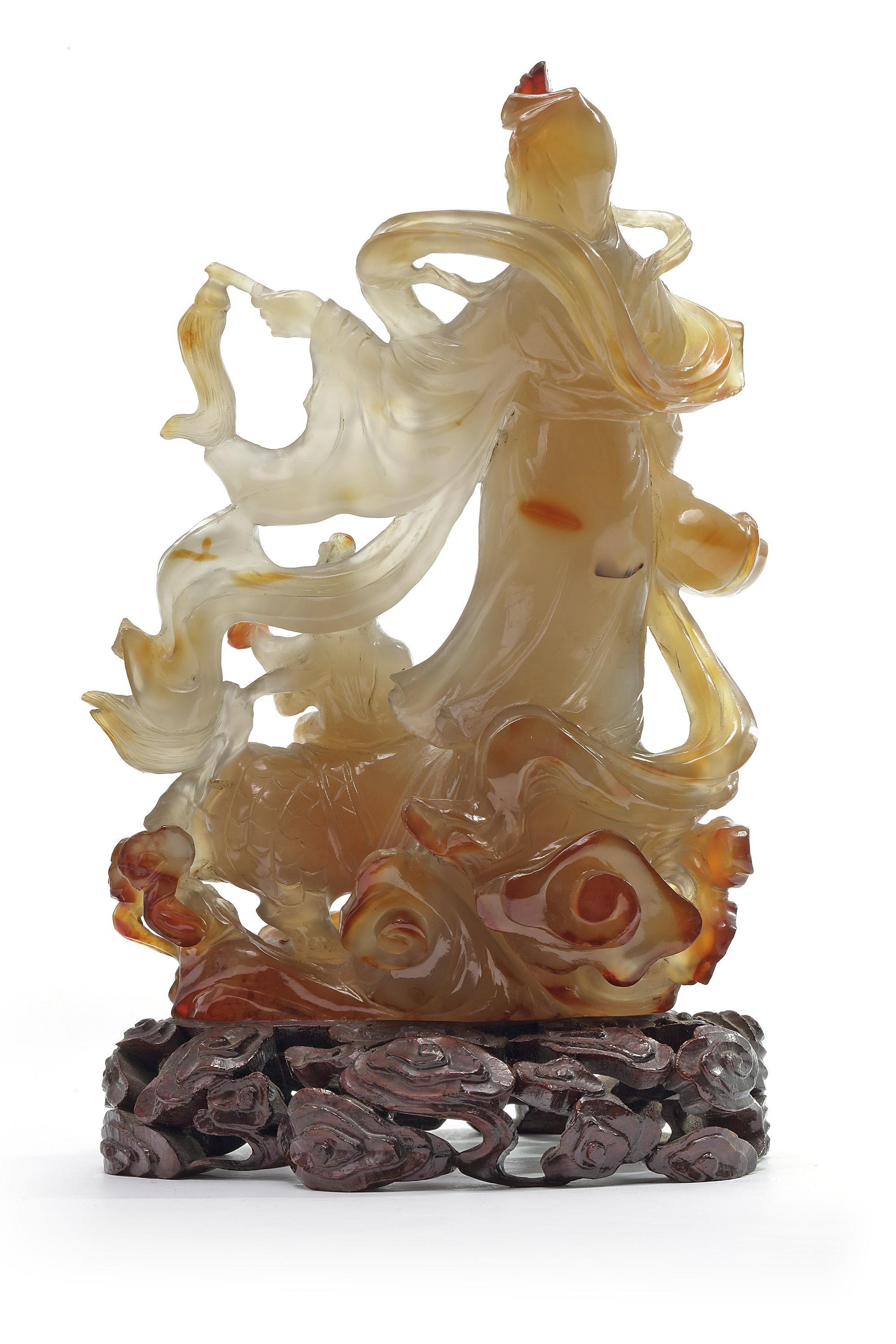 A Chinese agate Guanyin group